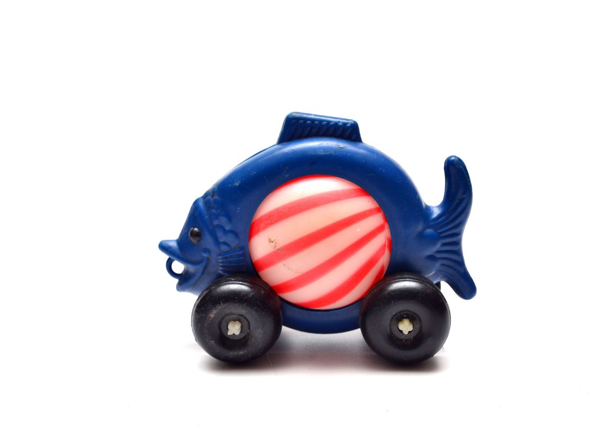 'blue fish toy' Poster by tony4urban | Displate