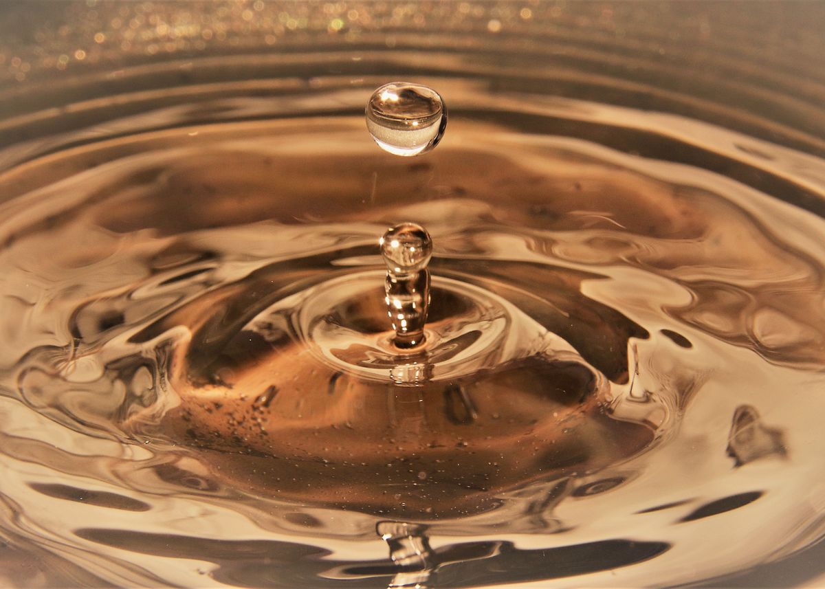 'Golden water droplets' Poster by Antony Robinson | Displate