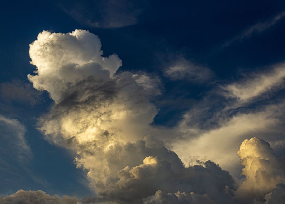 'big clouds in the sky' Poster by eric leroux | Displate