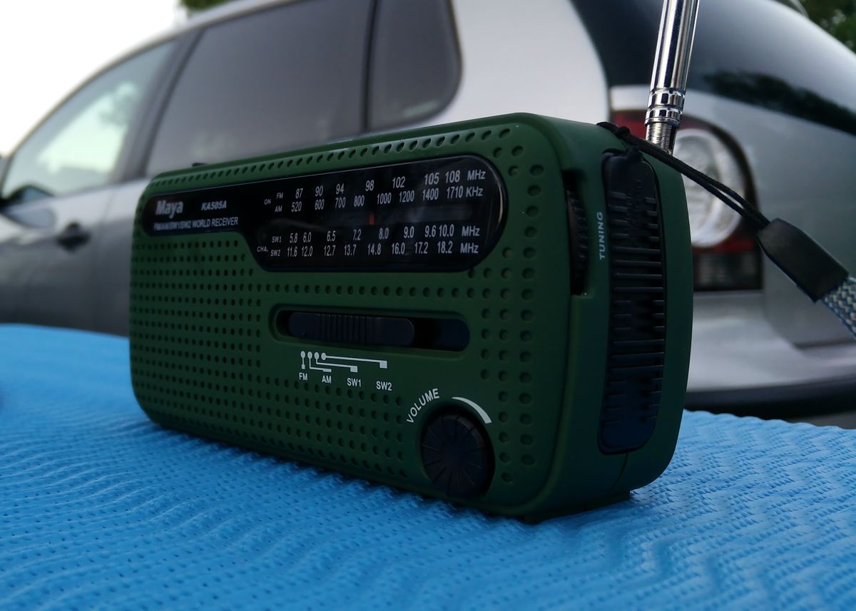 'Outdoor Tunes: A Classic Portable Radio in Focus' Poster, picture ...