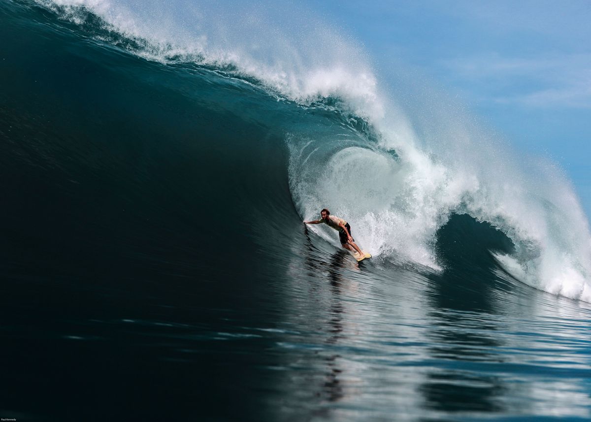 'Surfing giant waves' Poster by Paul Kennedy | Displate