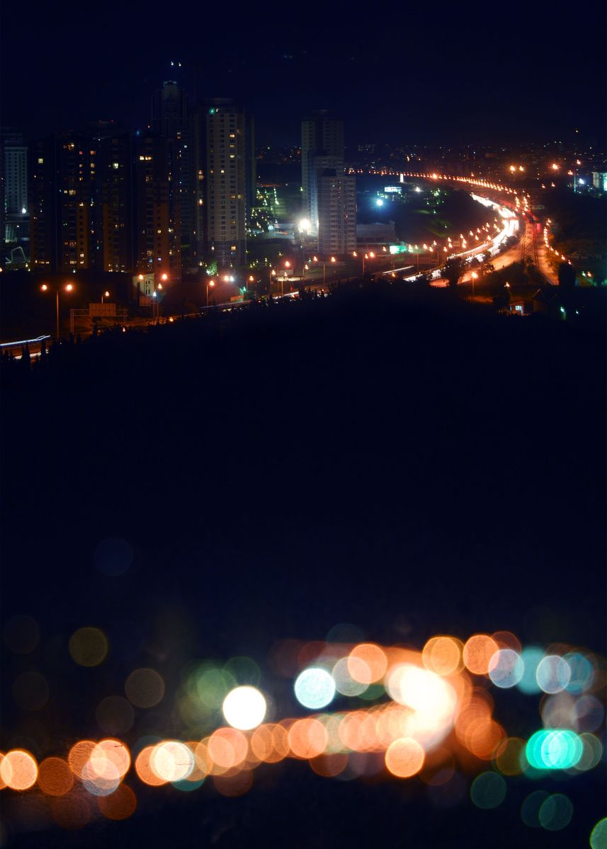 'city lights in focus' Poster by Alex Voinescu | Displate