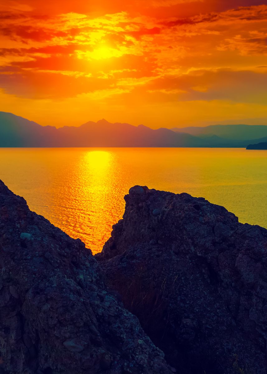 'Dramatic Sunset Over Rocky' Poster by Stunning Wallpapers | Displate