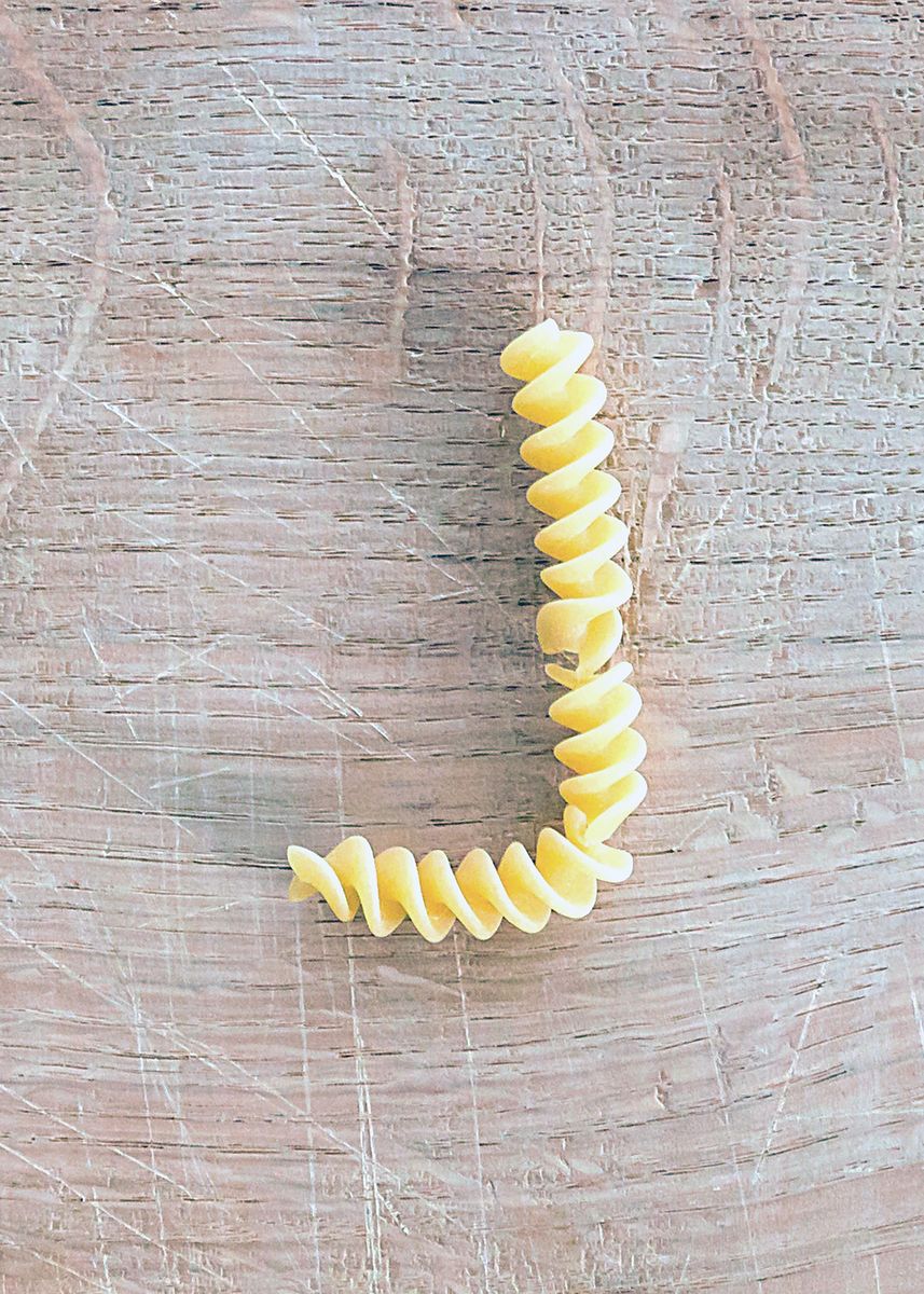 'Letter composed with pasta' Poster by Sergio Pazzano | Displate