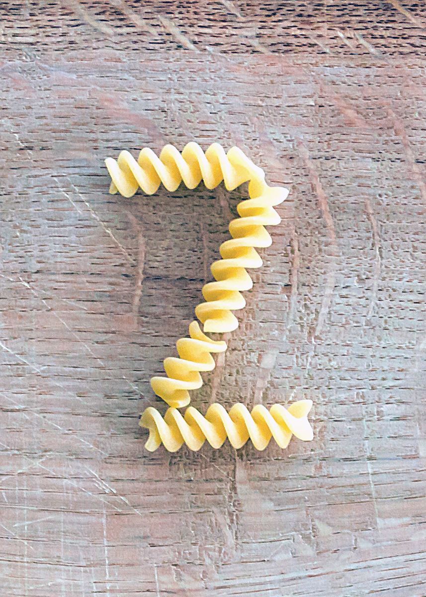 'Letter composed with pasta' Poster by Sergio Pazzano | Displate