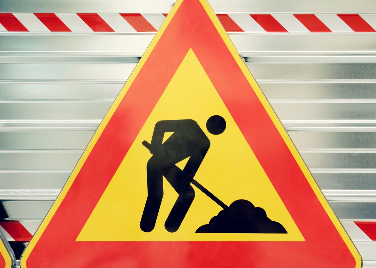 'Street sign man at work co' Poster by Gianfranco Grenar | Displate