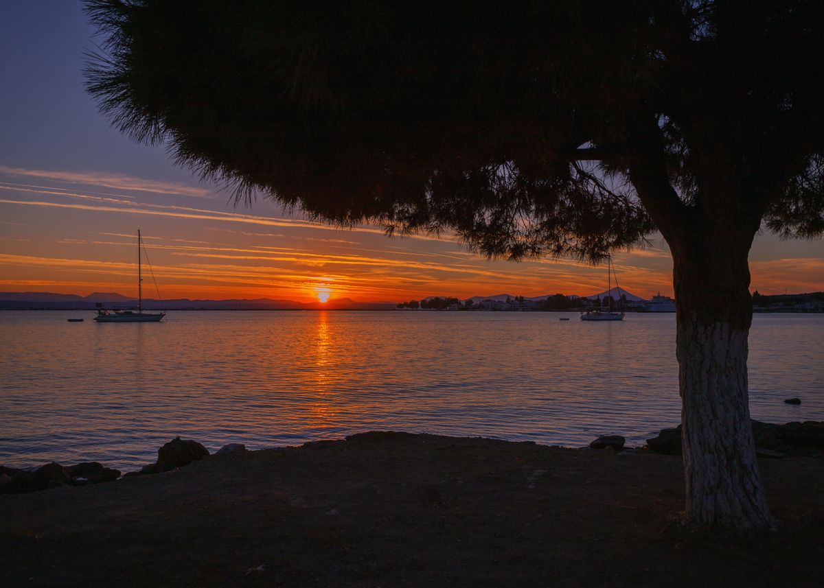 'Sunset over the Greek sea' Poster by anettastar | Displate